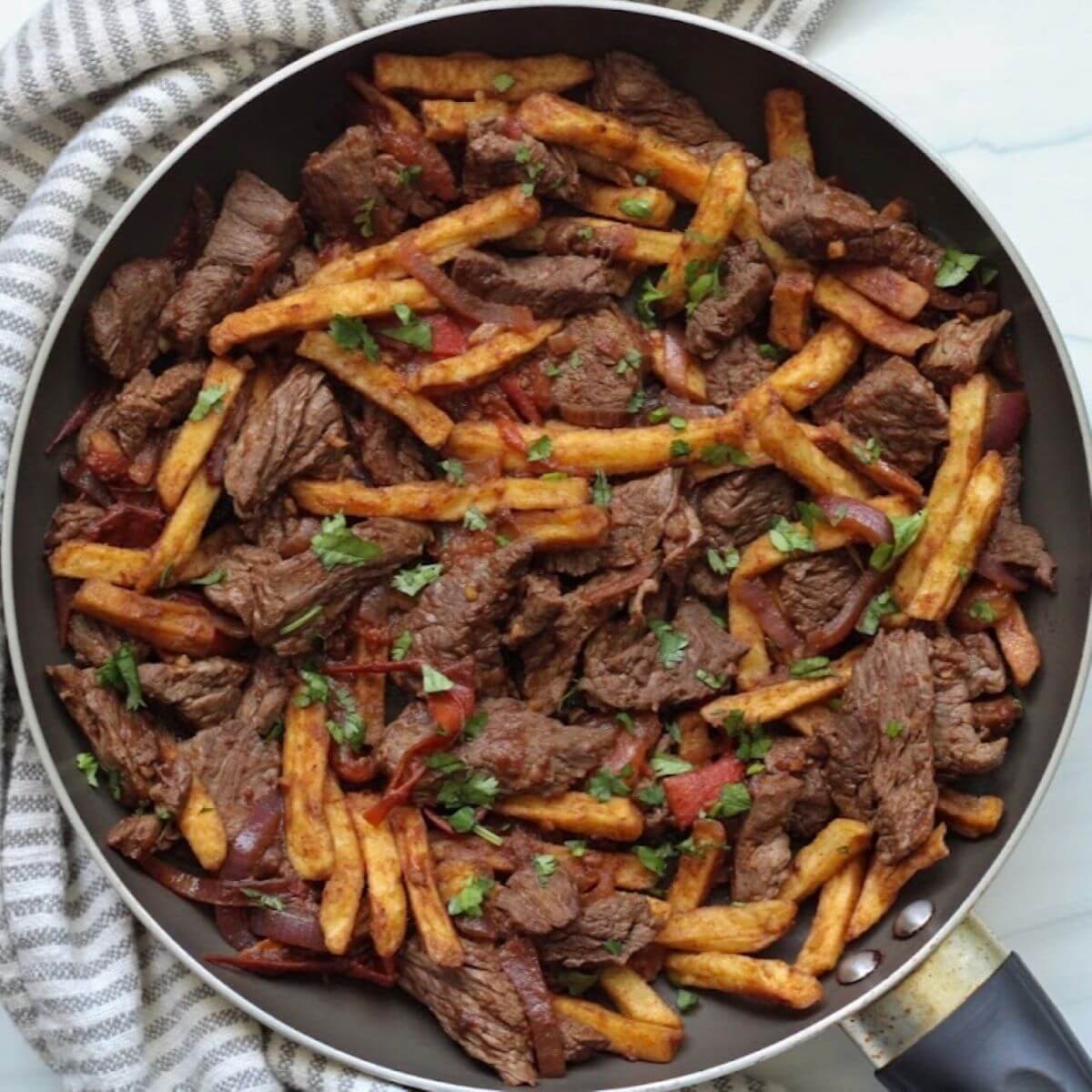 Gluten-Free Lomo Saltado Recipe - The Nomadic Fitzpatricks